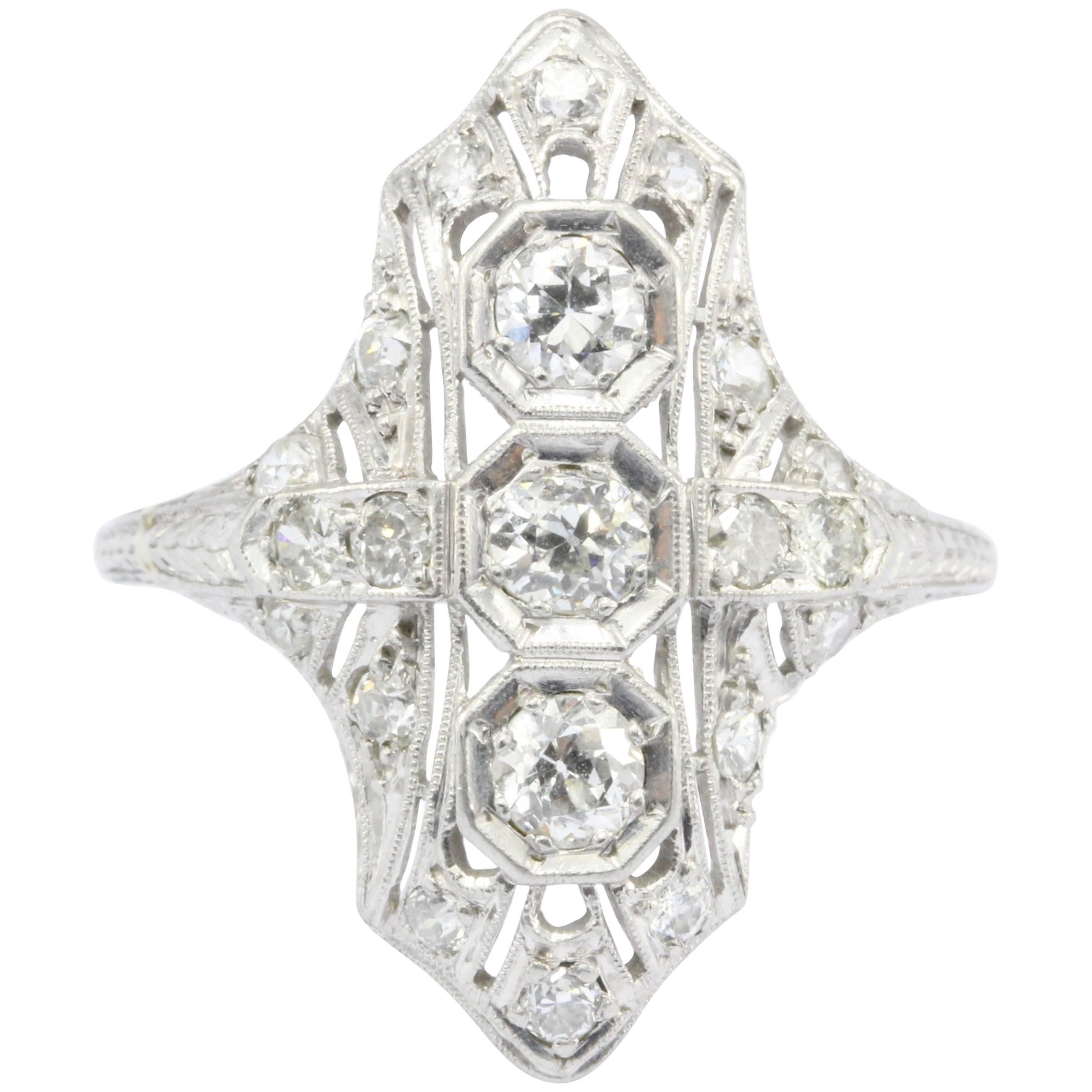 Art Deco Platinum and Diamond Three-Stone Shield Ring at 1stDibs