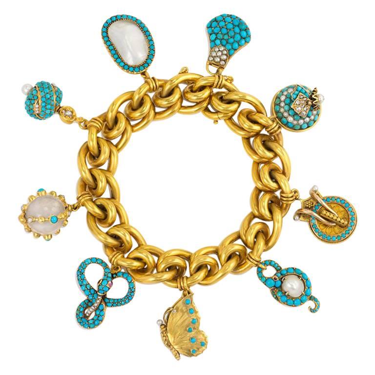 Antique Gold Bracelet with Assorted Turquoise and Pearl Charms at 1stDibs