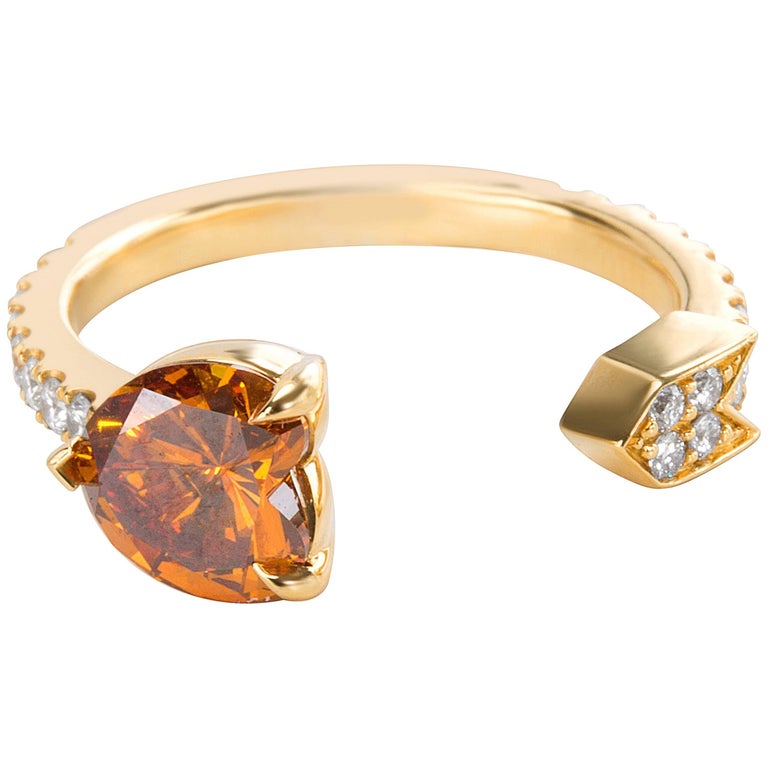 Fancy Deep Yellowish Diamond in Modern Wave Gold Ring GIA Certified 0. ...