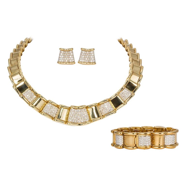 Moboco 18 Karat Yellow Gold and Diamond Ribbon Jewelry Set at 1stDibs