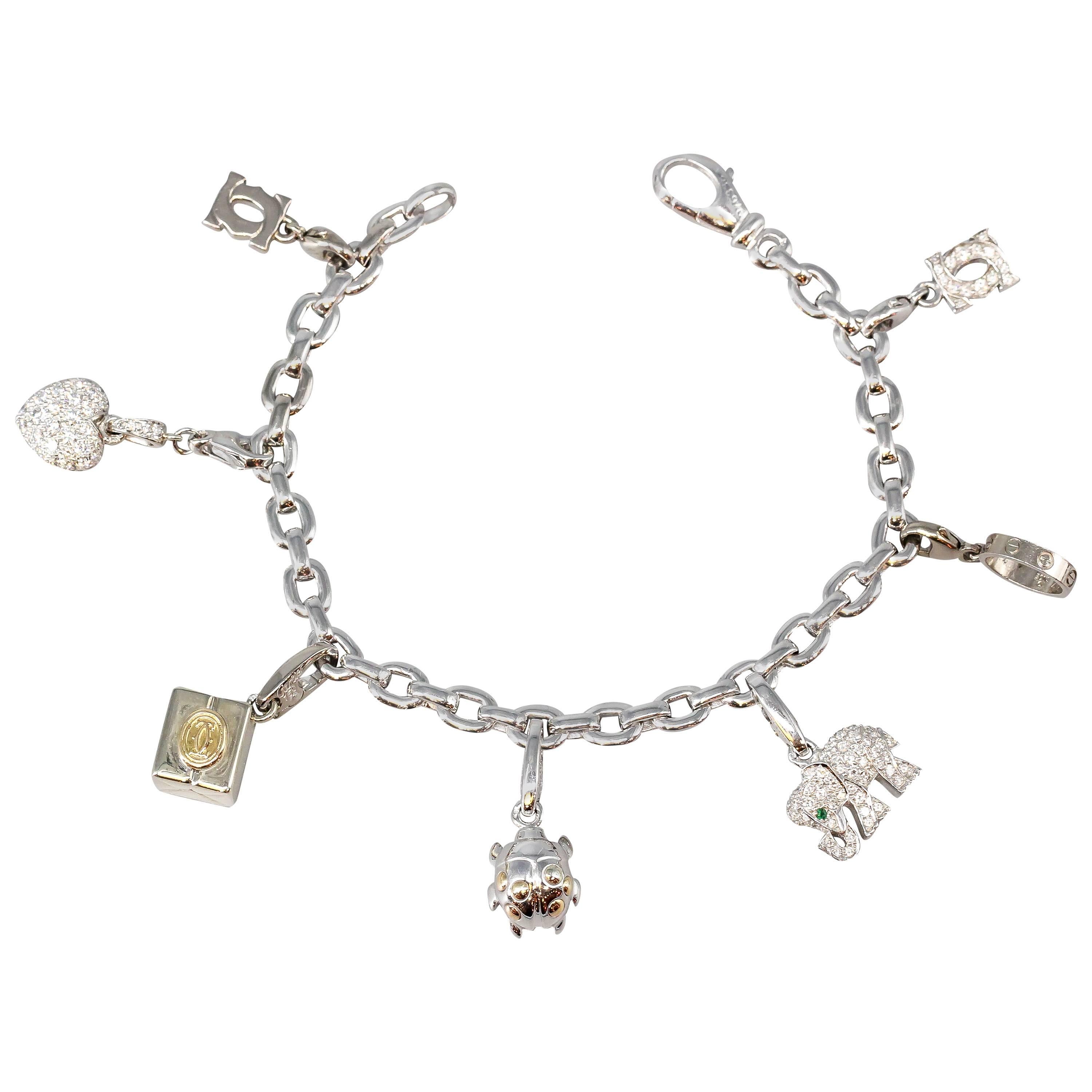 Cartier Diamond Gold Charm Bracelet at 1stDibs