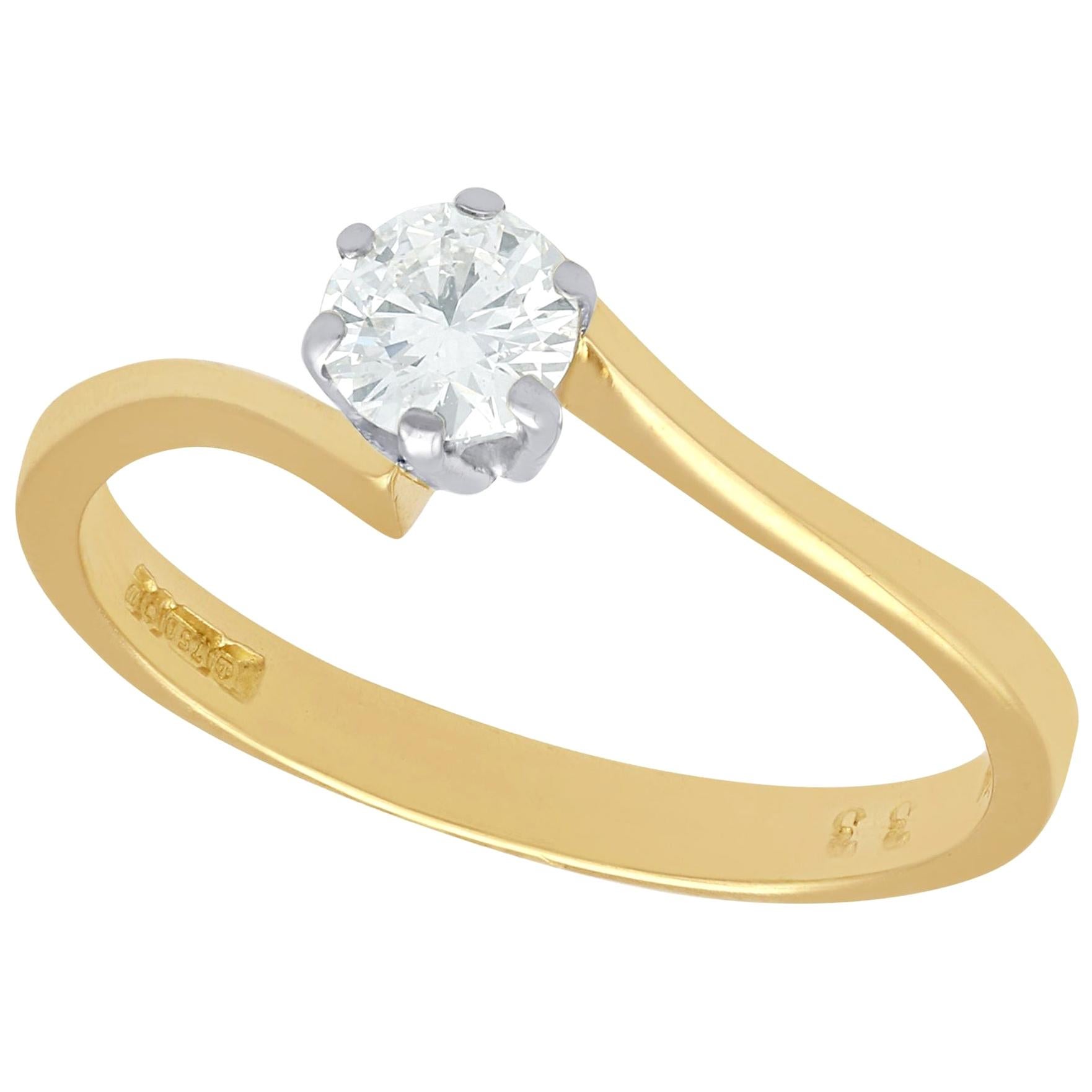 Diamond and Yellow Gold Twist Solitaire Engagement Ring For Sale at 1stDibs