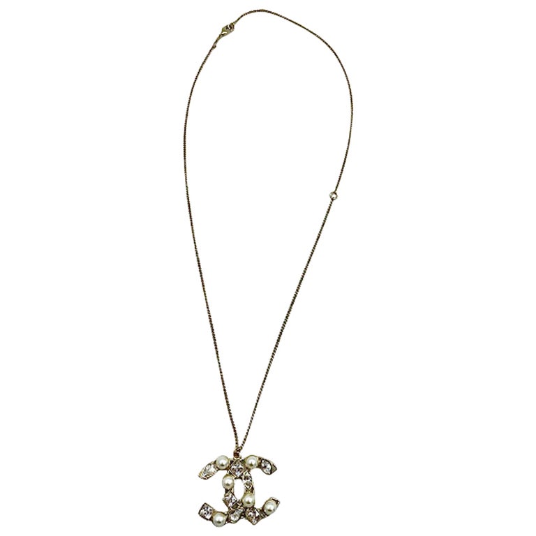 CHANEL CC Pendant Necklace in Gilt Metal, Pearls and Rhinestones at 1stDibs