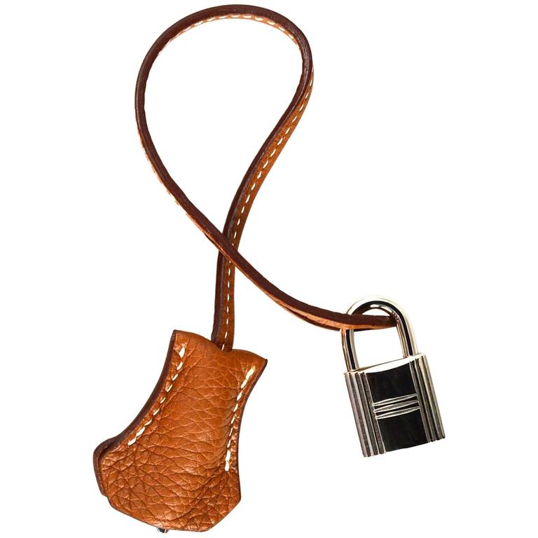Hermes Brown Clemence Clochette and Palladium Padlock For Sale at 1stDibs