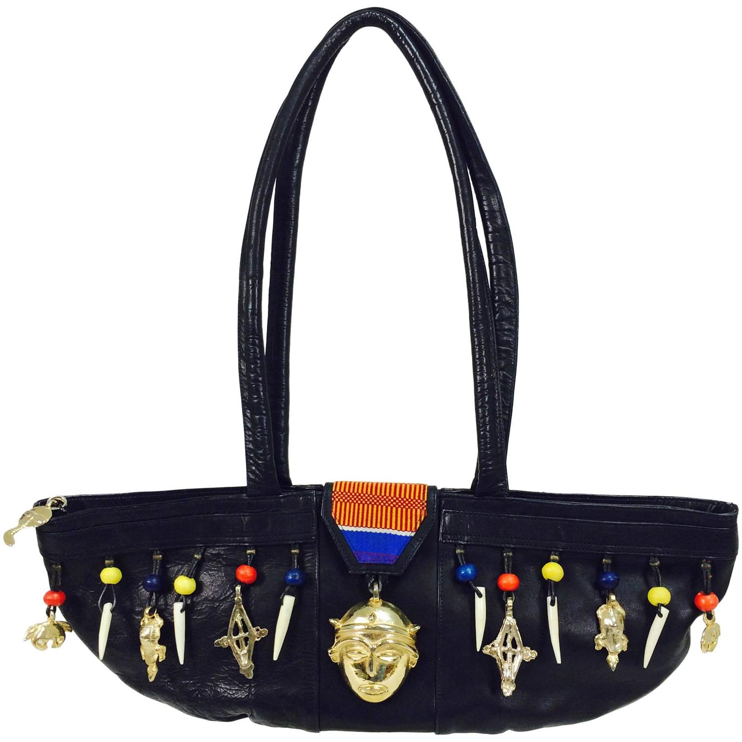 Novelty black leather unique shape tribal charm handbag at 1stdibs