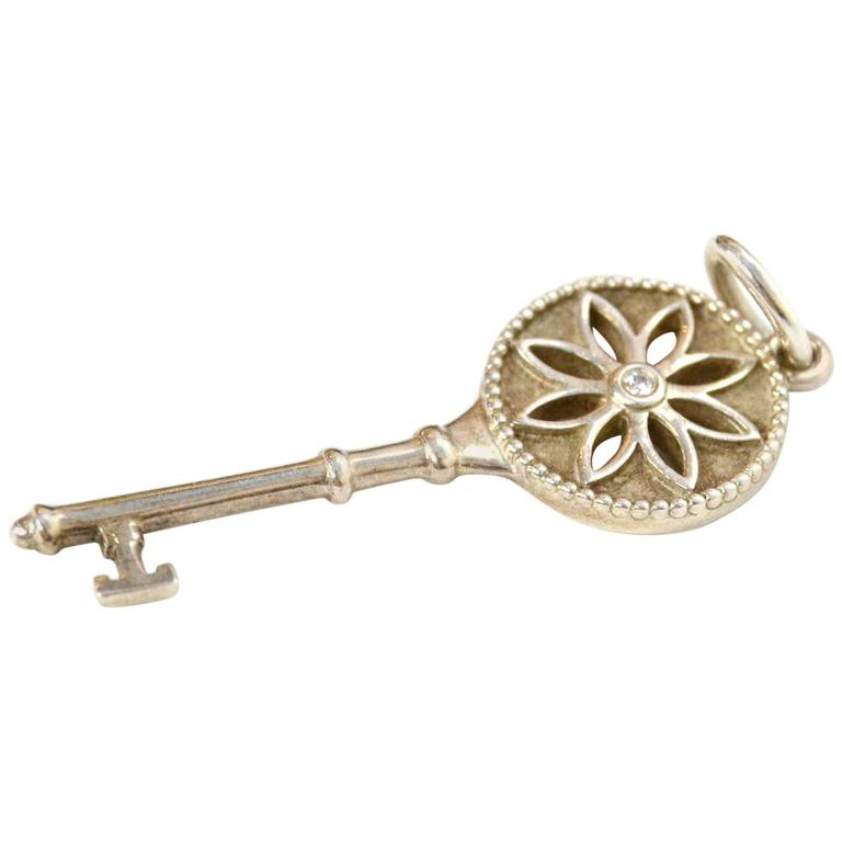 Tiffany and Co. Sterling and Diamond Daisy Key Pendant For Sale at 1stDibs