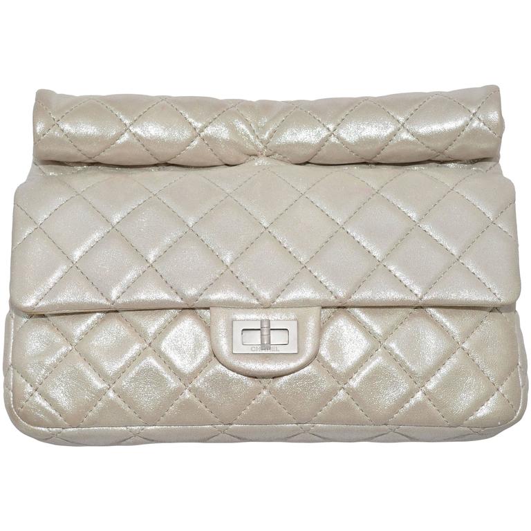 Chanel 2012 Metallic Silver Qulited Rolled Handle Clutch Bag at 1stDibs