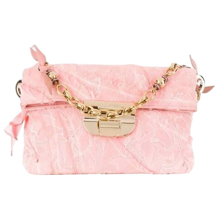 2000s Nina Ricci pink leather laced small bag For Sale at 1stDibs