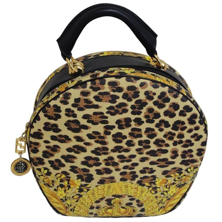 MINT. Vintage Gianni Versace leopard and gorgeous print round bag with ...