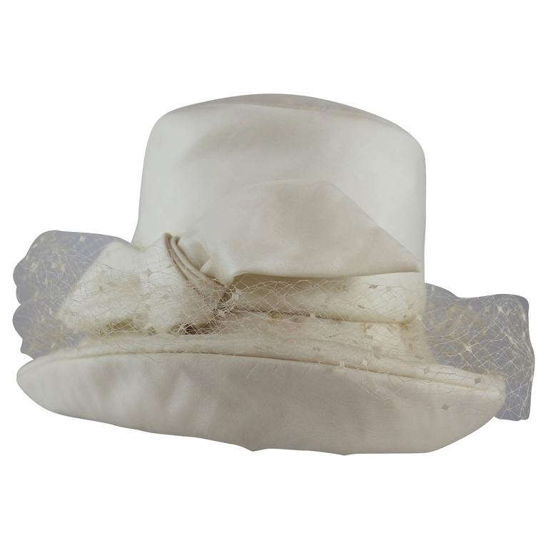 Fleurette Ivory Silk Hat with Bow, Mesh, and Pins For Sale at 1stDibs