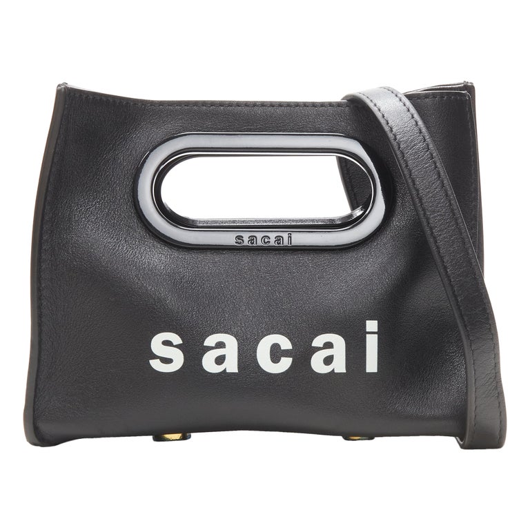 SACAI black leather white logo print crossbody micro shopper tote bag ...