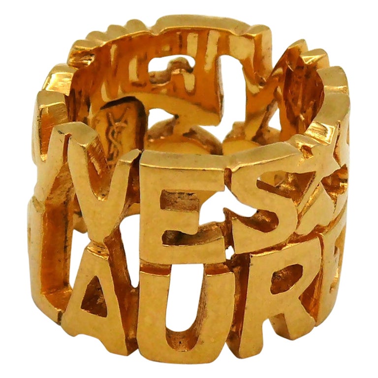 YVES SAINT LAURENT YSL Vintage Gold Tone Signature Ring For Sale at 1stDibs