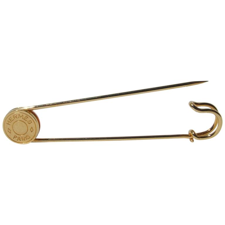 Hermes Golden Pin Brooch at 1stDibs
