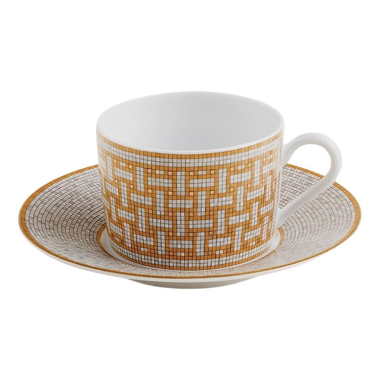 Hermes Mosaique au 24 gold tea cup and saucer Set of two For Sale at ...