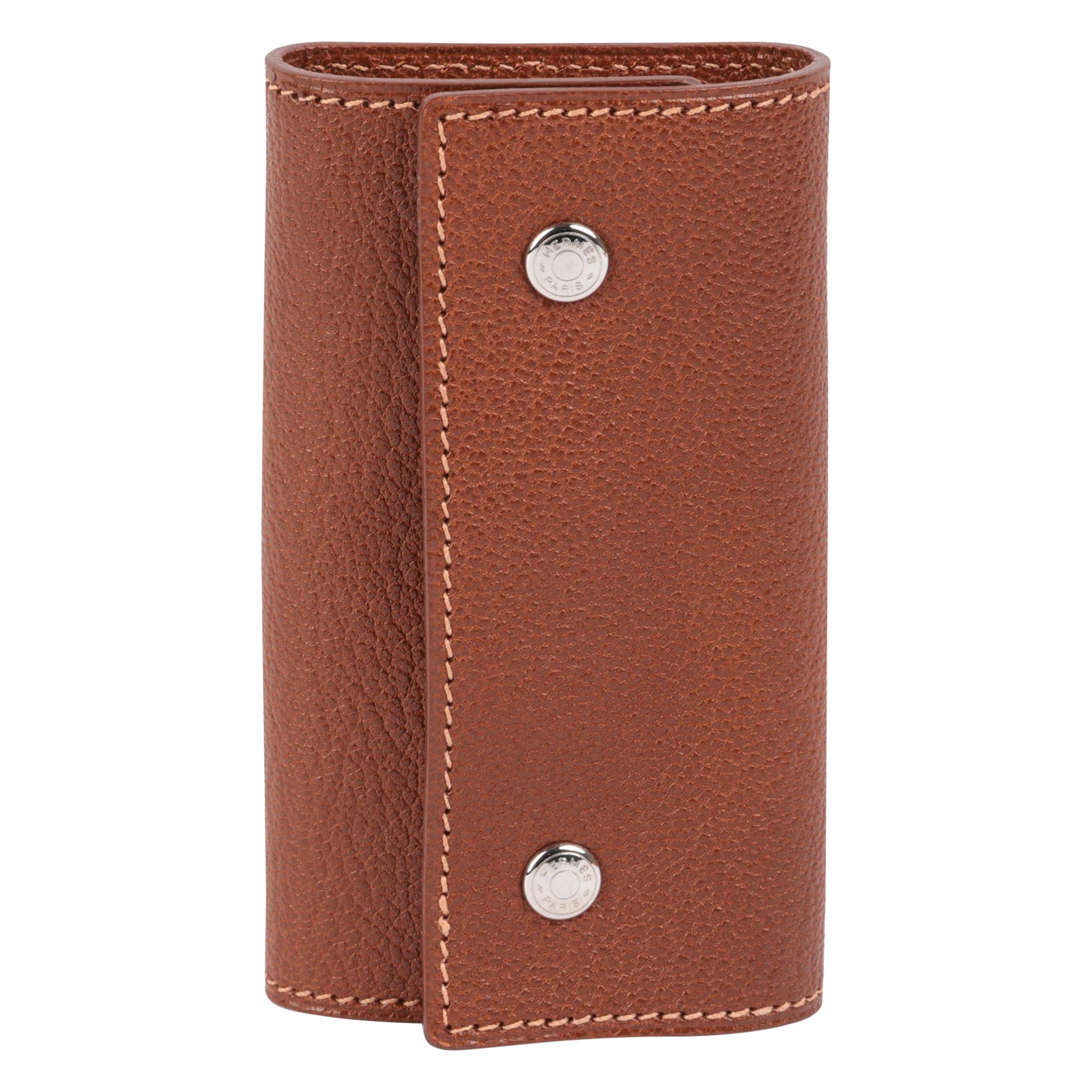 Hermès Cuivre Taurillion Leather Key Holder at 1stDibs | hermes key holder