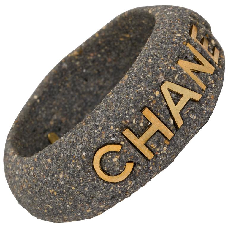 Chanel Rare Grey Stone Signature Cuff Bracelet at 1stDibs