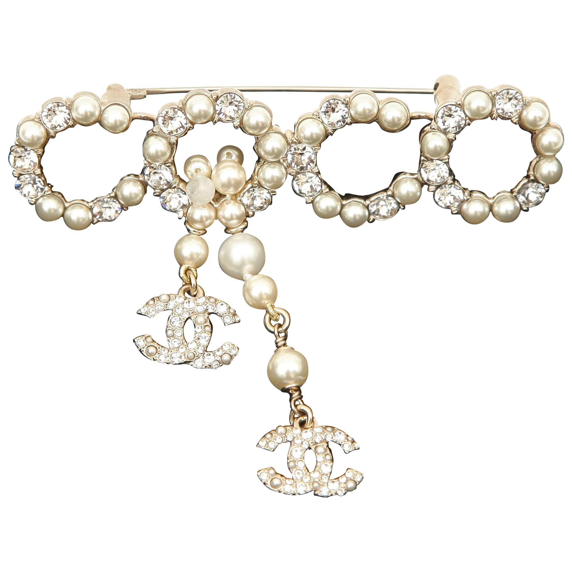 Chanel Pearl Mademoiselle Coco Sitting on Large CC Resin Pin at 1stDibs