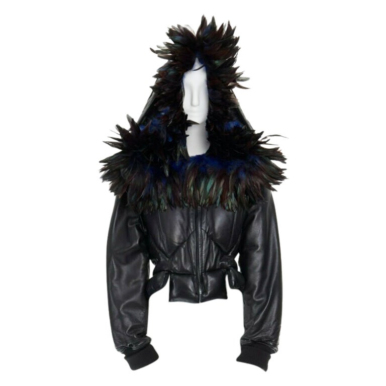 runway YOHJI YAMAMOTO 1991 black padded leather oversized feather hood ...