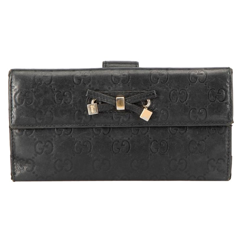 Cartera Gucci de mujer de piel negra con detalle de lazo Guccissima en ...