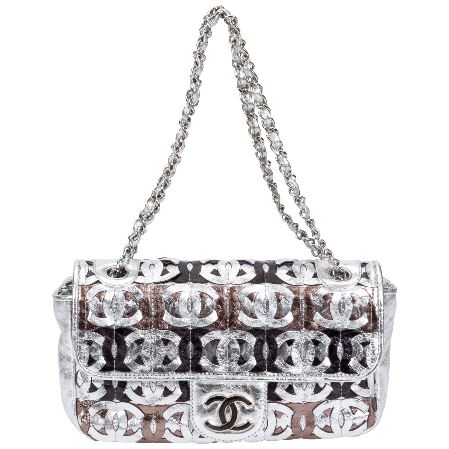 Chanel Silver Metallic Logo Evening Bag at 1stdibs