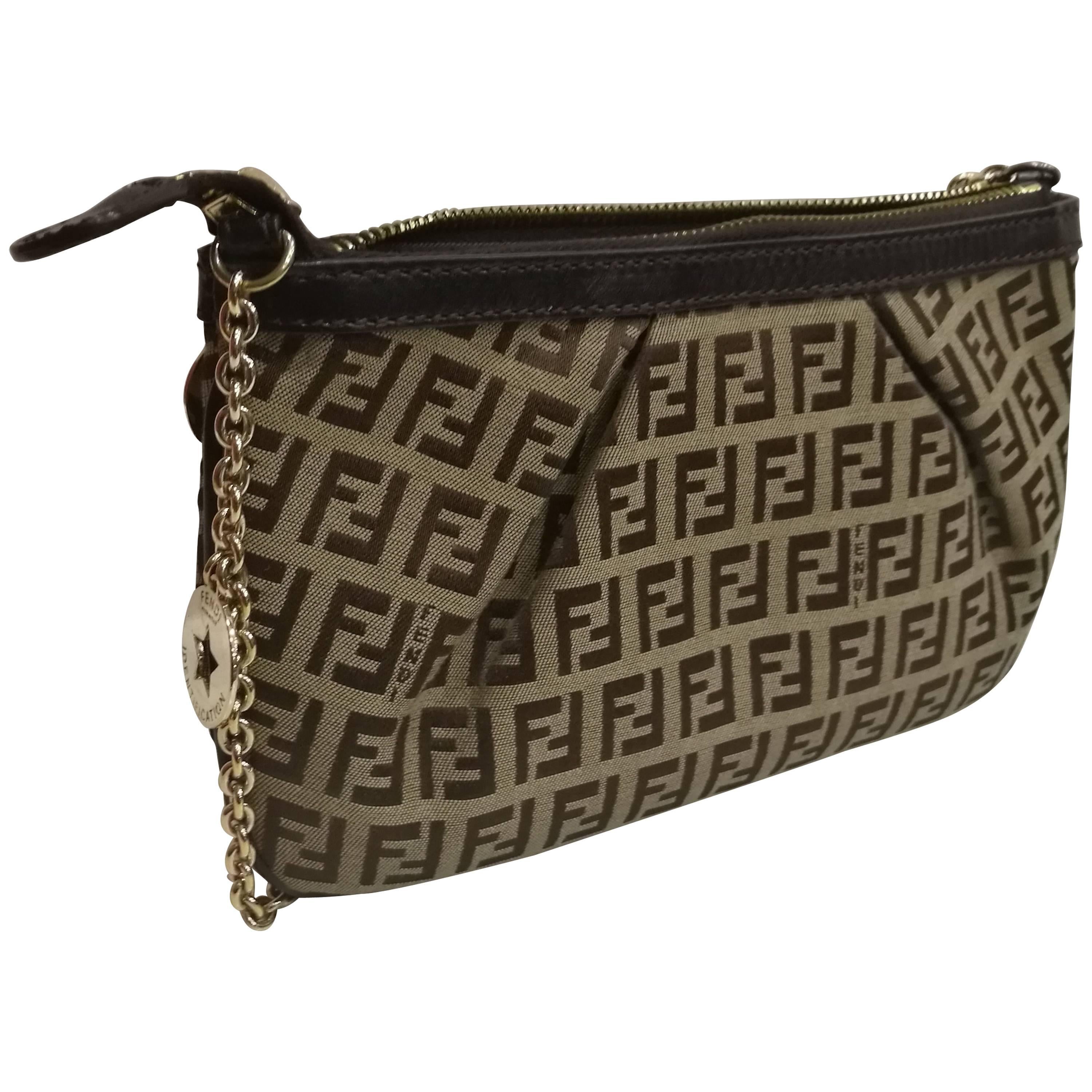 Fendi monogram pochette at 1stDibs | pochette fendi monogram, fendi ...