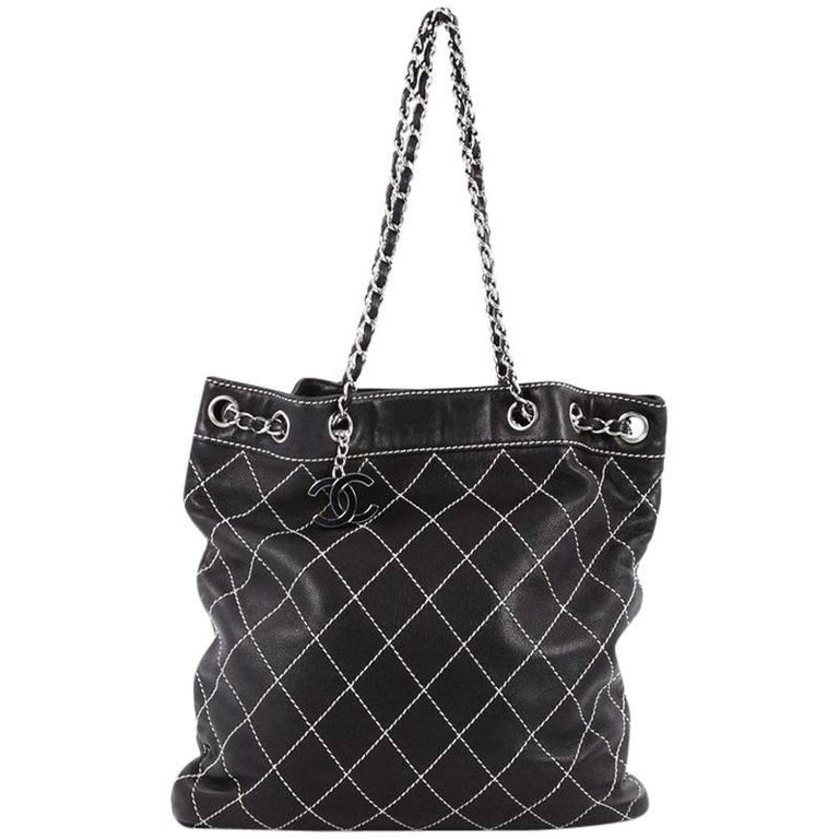 Chanel Surpique Drawstring Bucket Bag Quilted Lambskin Large at 1stDibs