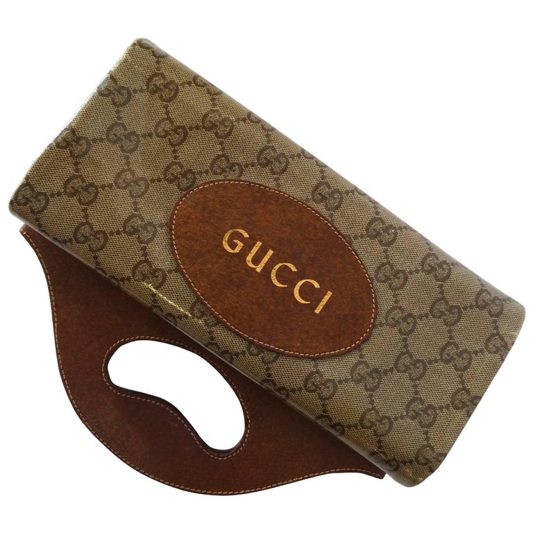 1970s Gucci Monogram Canvas Vinyl Fold-over Hand Bag at 1stDibs | 1970s ...