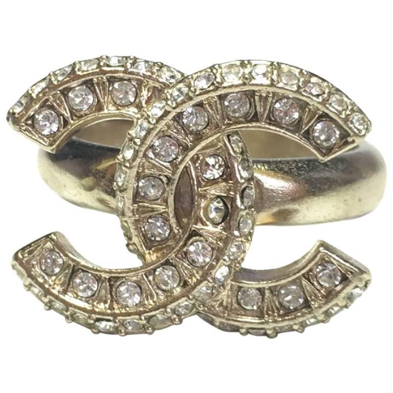 CHANEL CC Ring in Gilded Metal set with Rhinestones 52FR at 1stDibs