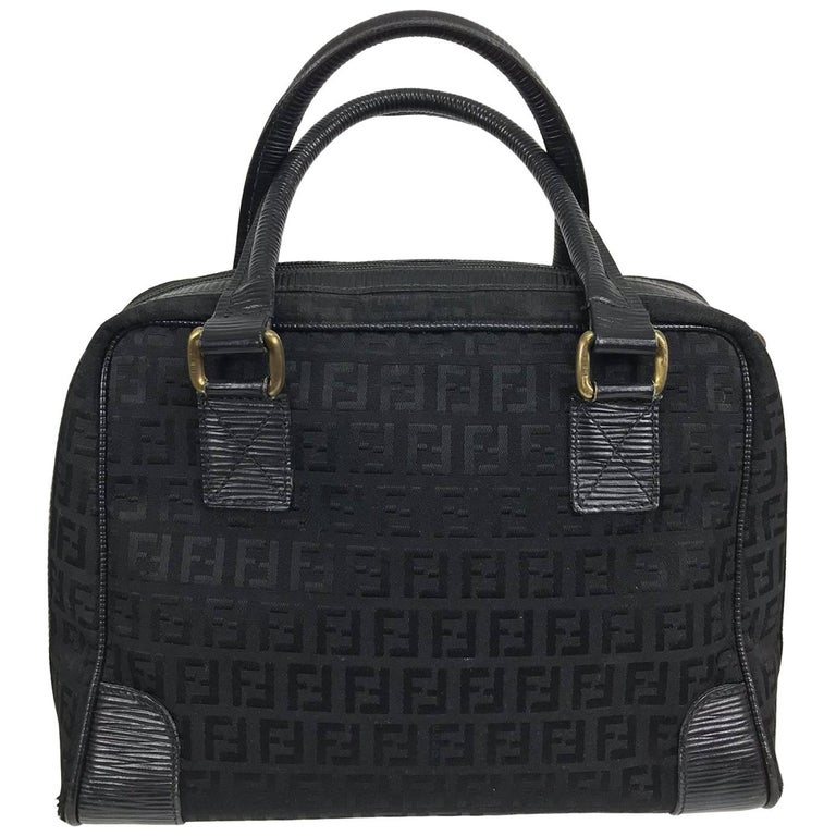 Fendi black logo canvas and leather handbag 1970s at 1stDibs