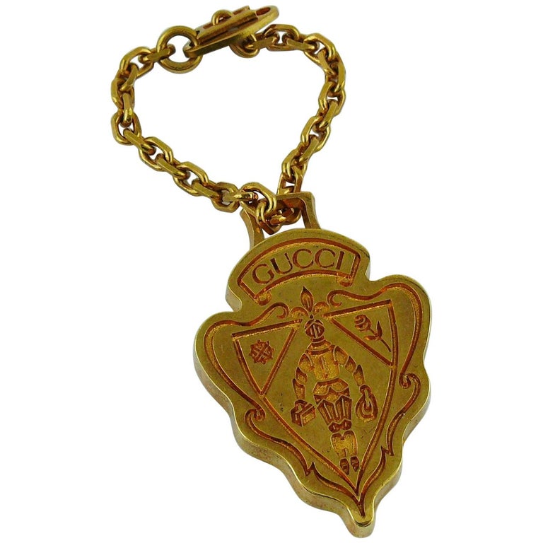 Gucci Vintage Gold Toned Crest Accessory at 1stDibs