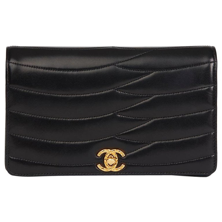 1992 Chanel Black Wave Quilted Lambskin Vintage Classic Clutch at 1stDibs