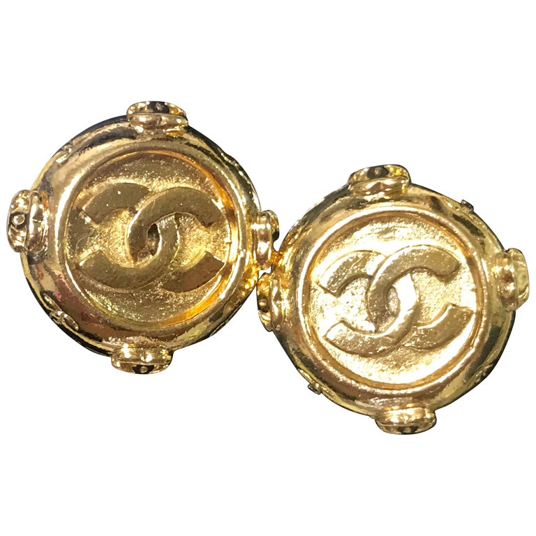 Chanel Vintage gold tone round earrings with multiple CC marks at 1stDibs