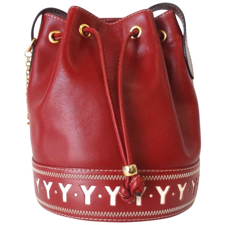 1980s Yves Saint Laurent Red Pebble Leather Bucket Bag at 1stDibs