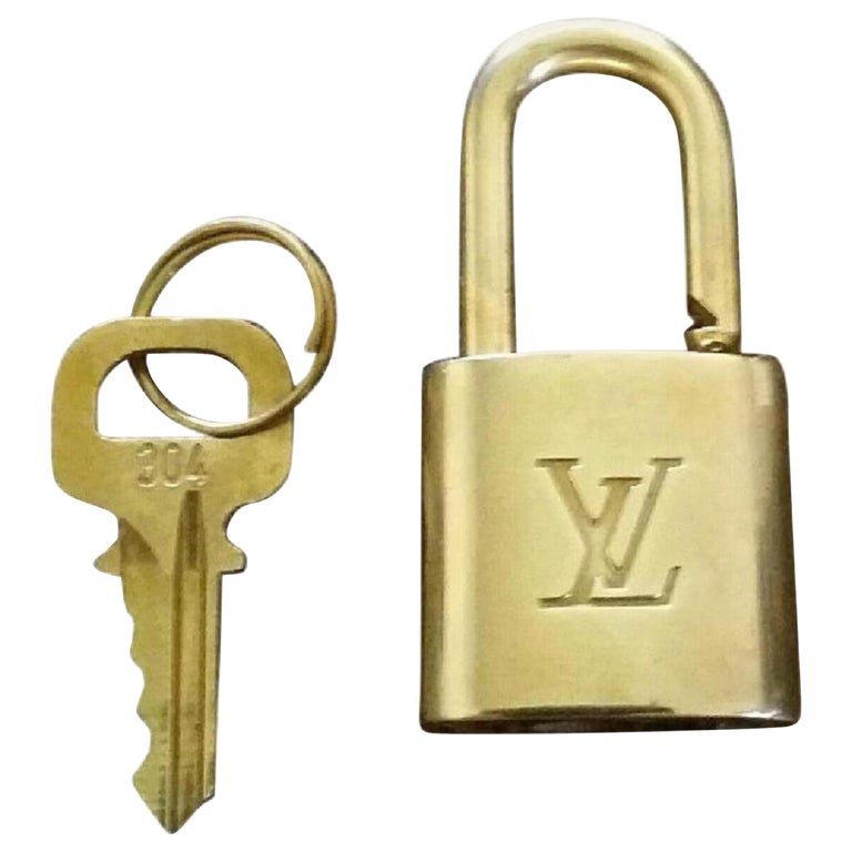Louis Vuitton Gold Single Key Lock Pad Lock and Key 867719 For Sale at ...