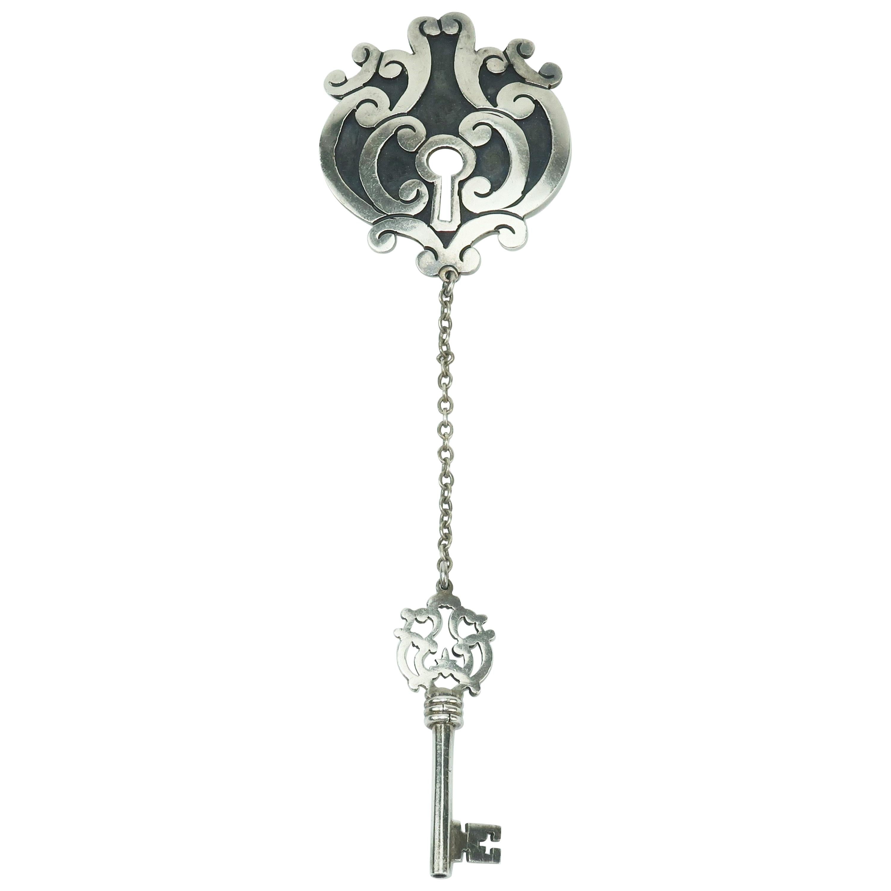 Vintage Taxco Mexican Sterling Silver Lock and Key Brooch at 1stDibs