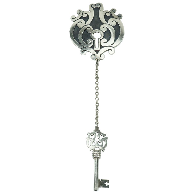 Vintage Taxco Mexican Sterling Silver Lock and Key Brooch at 1stDibs