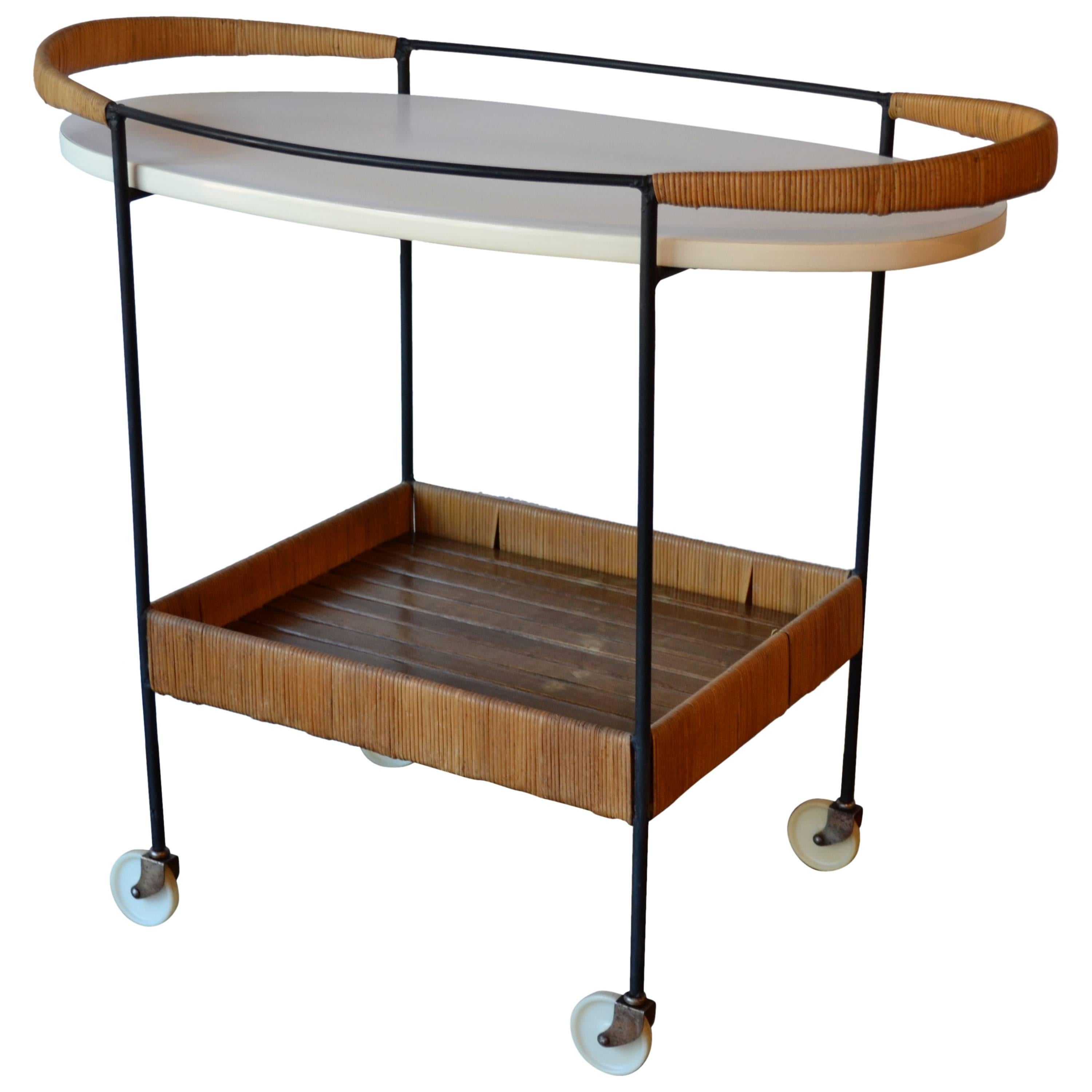 Oval Bar Cart by Arthur Umanoff, 1950s at 1stDibs