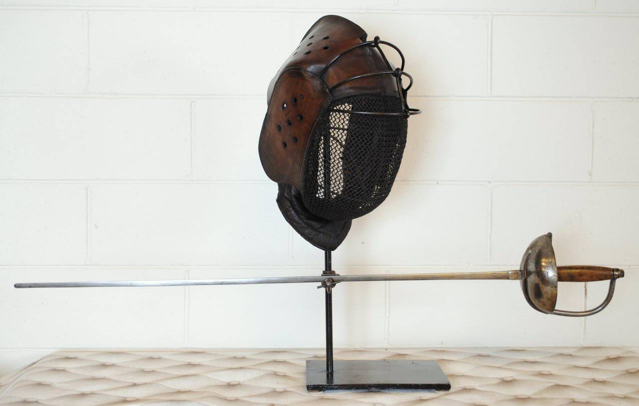 Antique Leather Fencing Mask and Rapier on Stand For Sale at 1stDibs