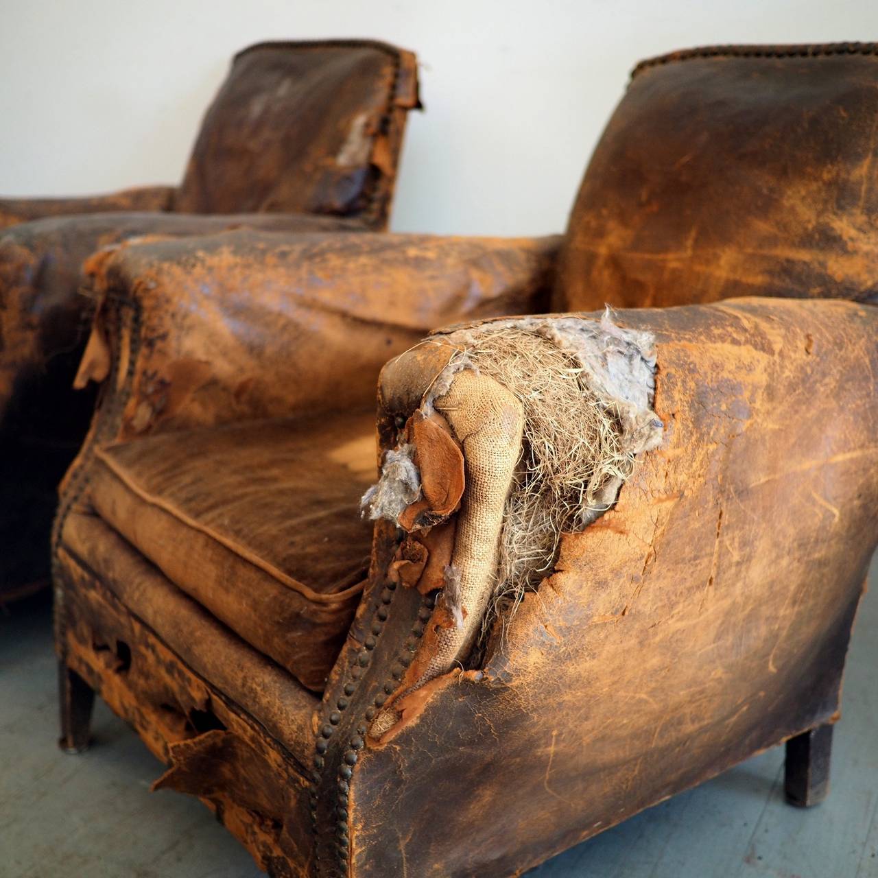 Pair of Distressed Leather Club Chairs at 1stDibs