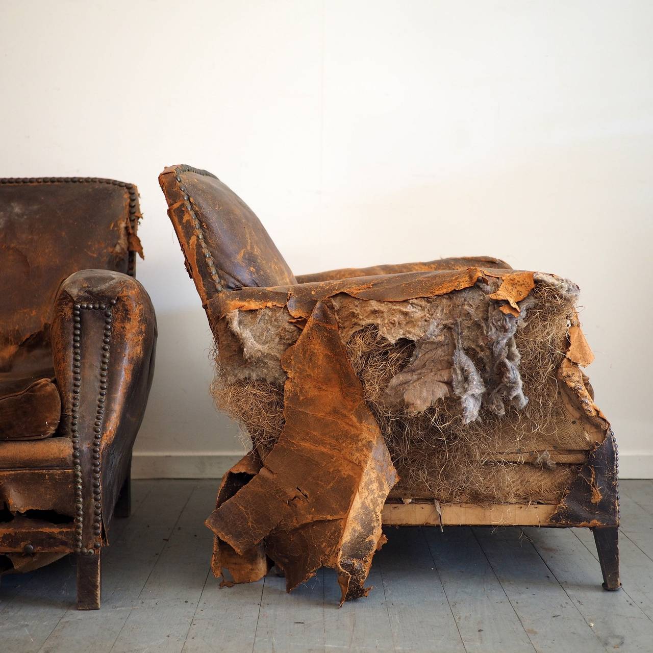Pair of Distressed Leather Club Chairs at 1stDibs