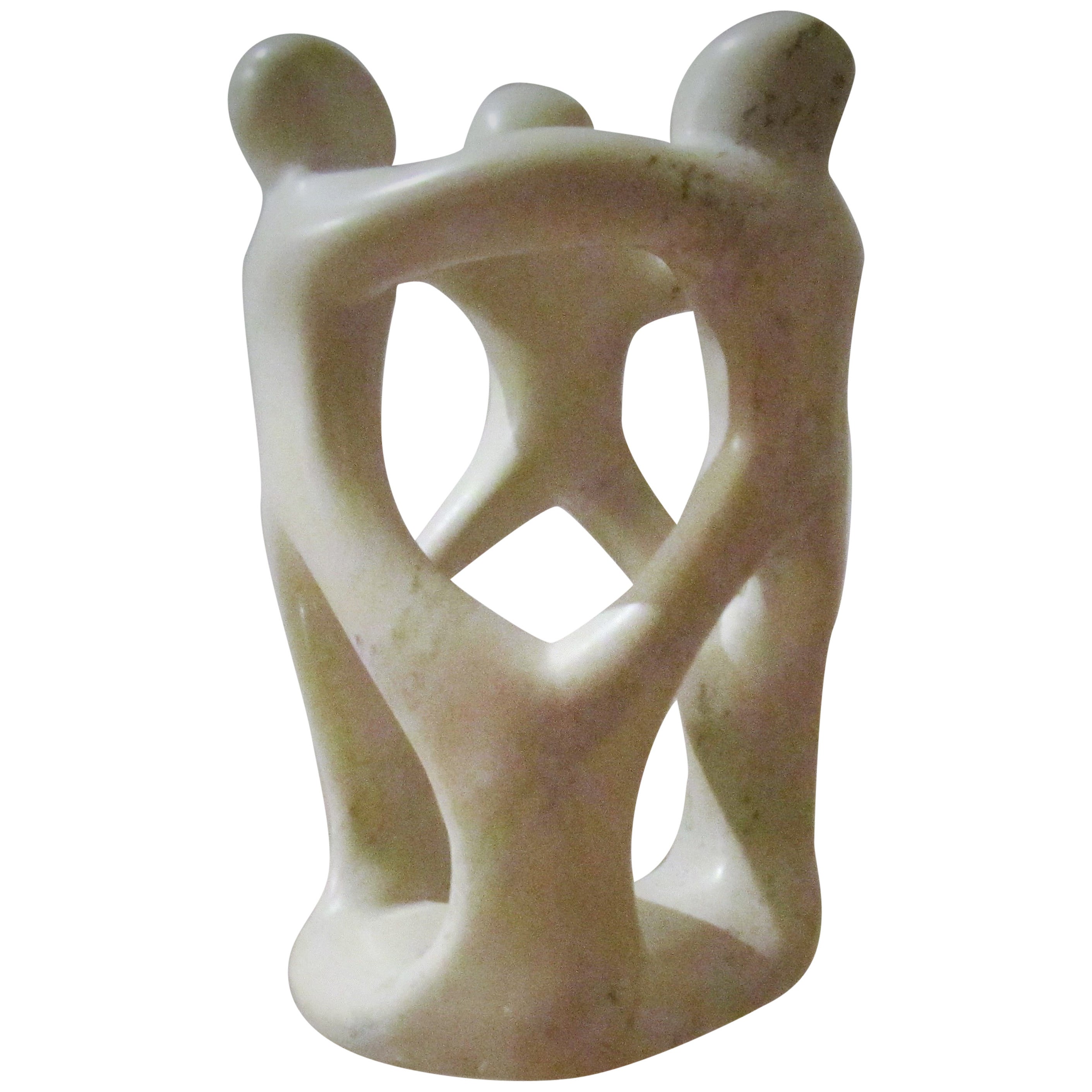 Vintage Stone Sculpture of Three People Embracing For Sale at 1stDibs