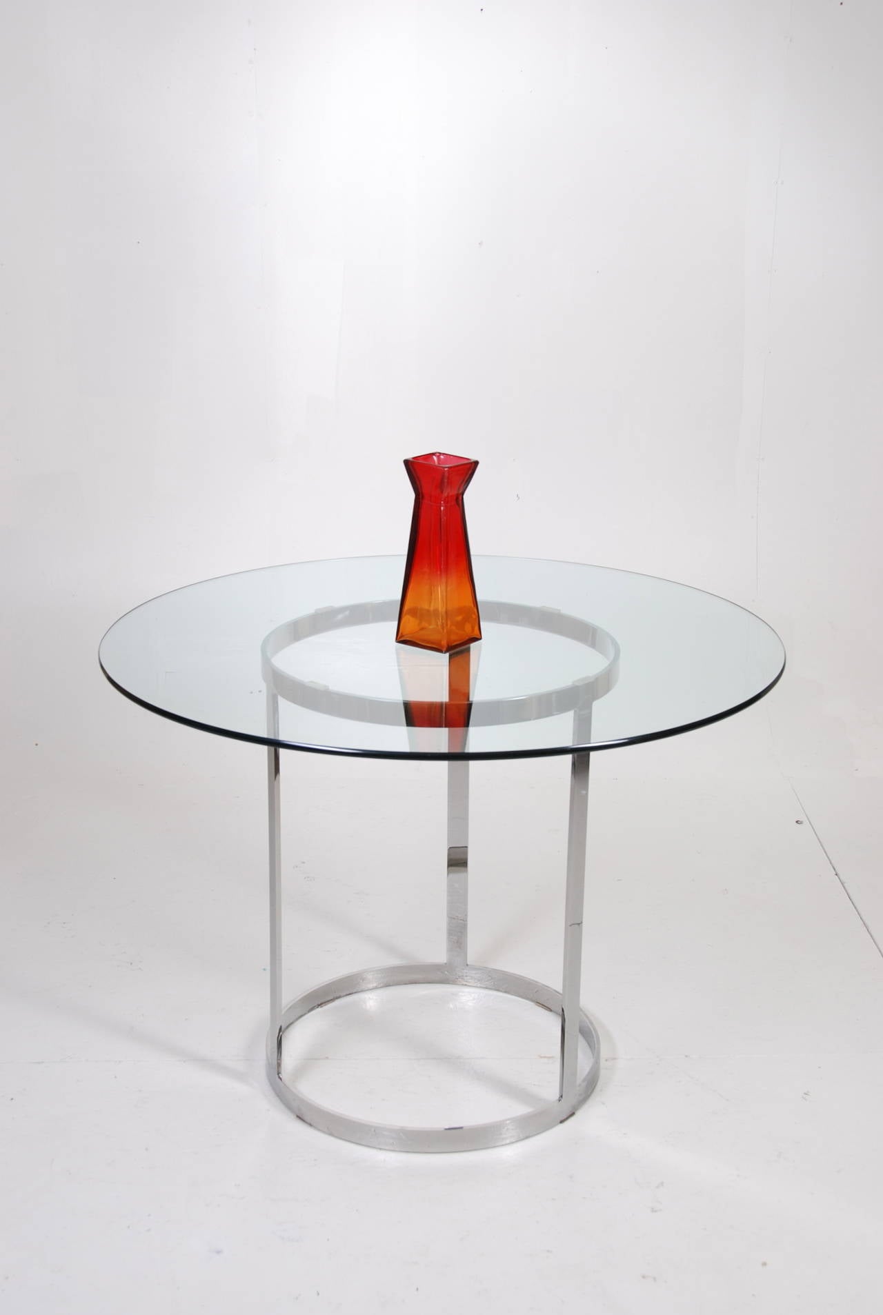 Milo Baughman Round Glass and Chrome Dining Table at 1stDibs
