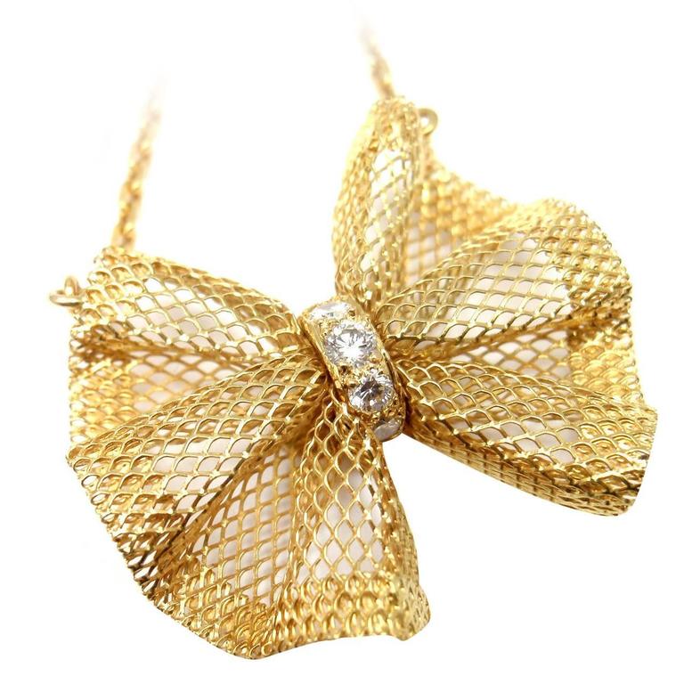 Van Cleef and Arpels Diamond Gold Bow Pendant Necklace at 1stDibs