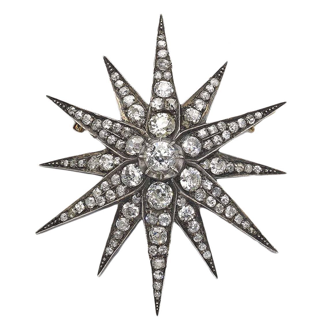 A Late Victorian diamond silver gold star brooch at 1stDibs