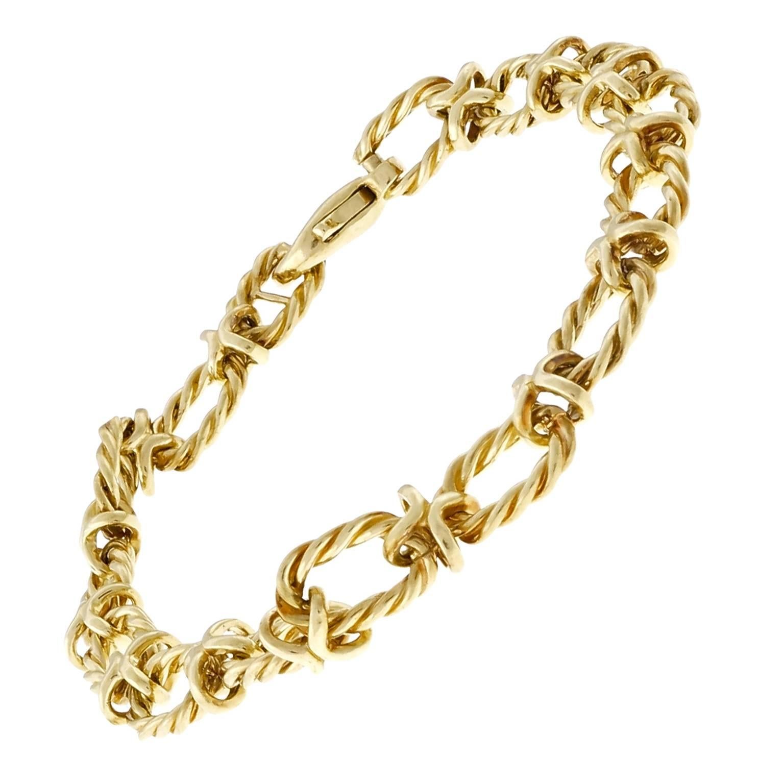 Tiffany and Co. Oval Twisted Cable Link Gold Bracelet at 1stDibs
