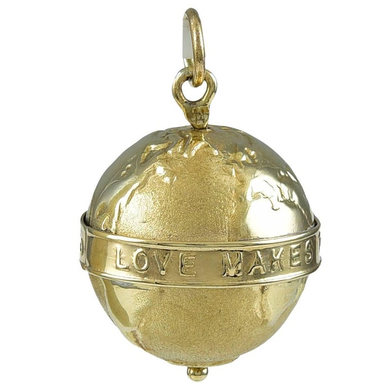 Love Makes the World Go Round Gold Globe Charm at 1stDibs