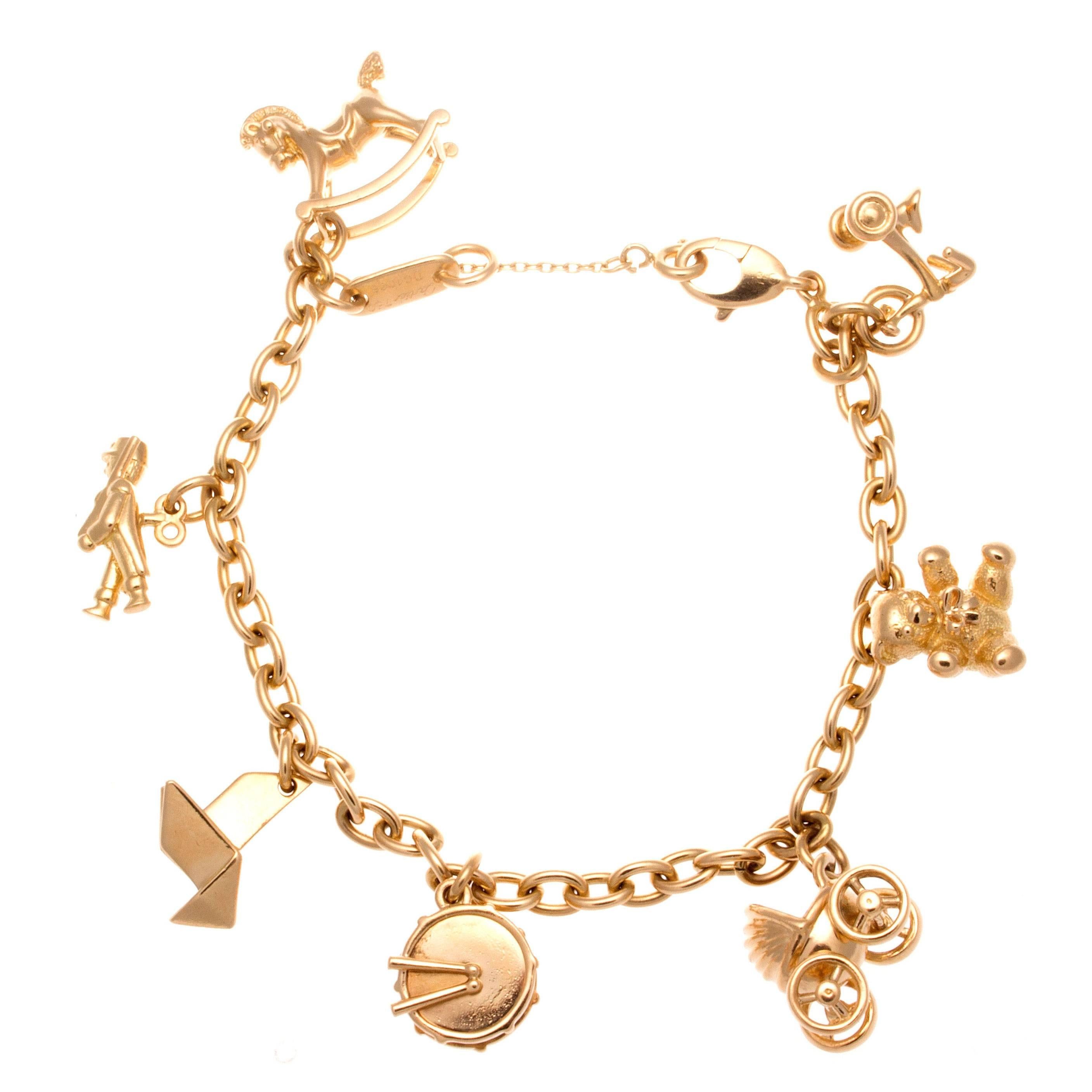 Cartier Gold Charm Bracelet at 1stDibs