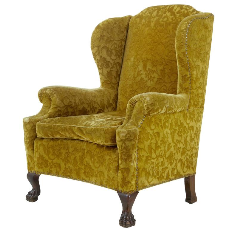 1920s Carved Mahogany Wingback Armchair at 1stDibs