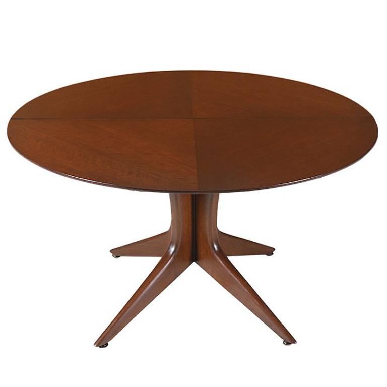Mid-Century Expanding Dining Table with Sculpted Star Base at 1stDibs