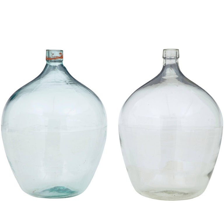 Two Large Glass Distillery Bottles at 1stDibs